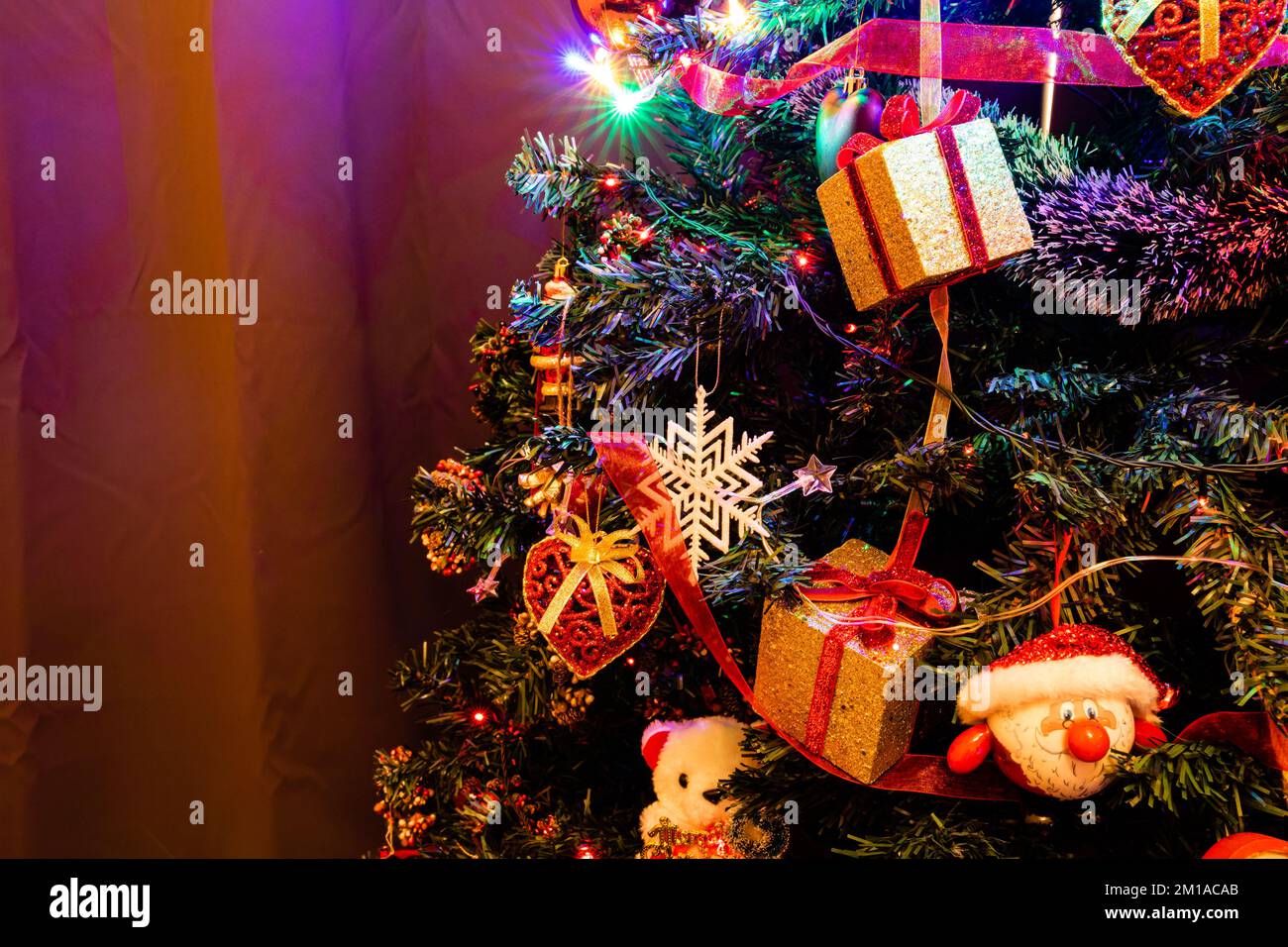 Christmas tree decorations with Christmas lights Stock Photo - Alamy