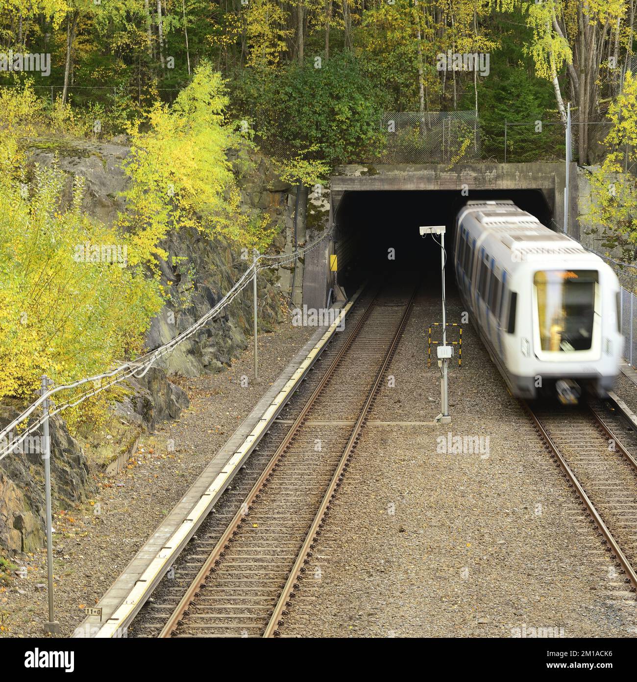 Commuter train entering tunnel hi-res stock photography and images - Alamy