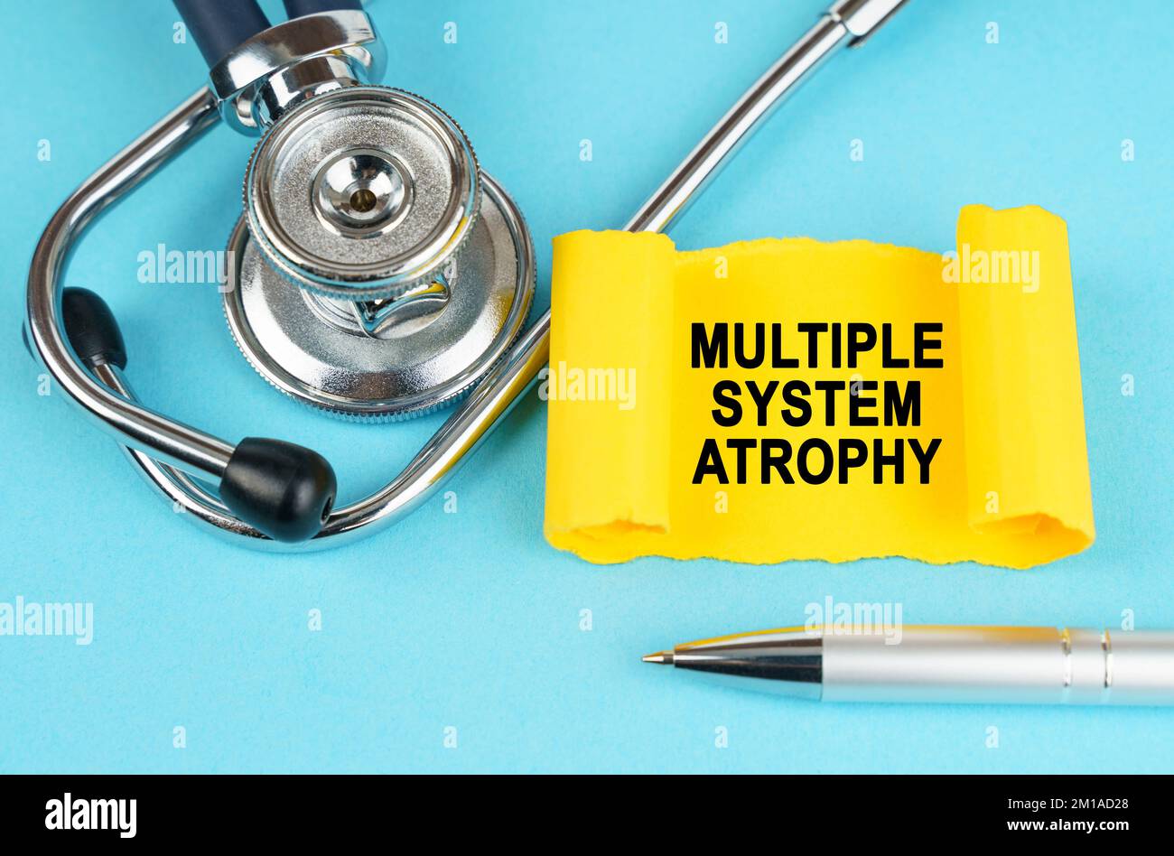 Medical concept. On the blue surface there is a stethoscope, a pen and ...