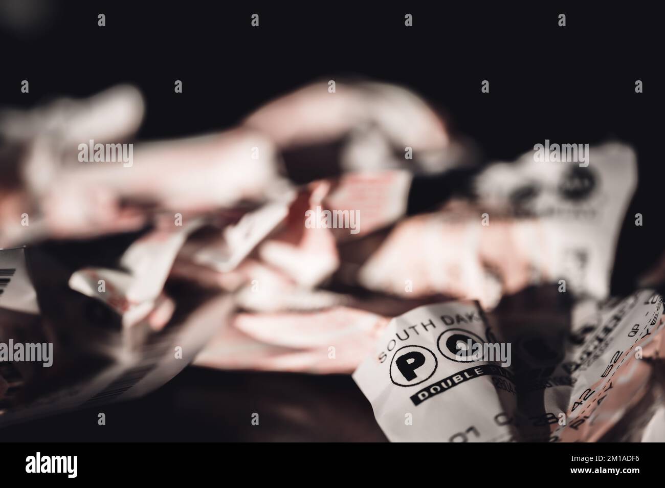 Sioux Falls, South Dakota, USA - 11.2022 - pile of wadded up and ...