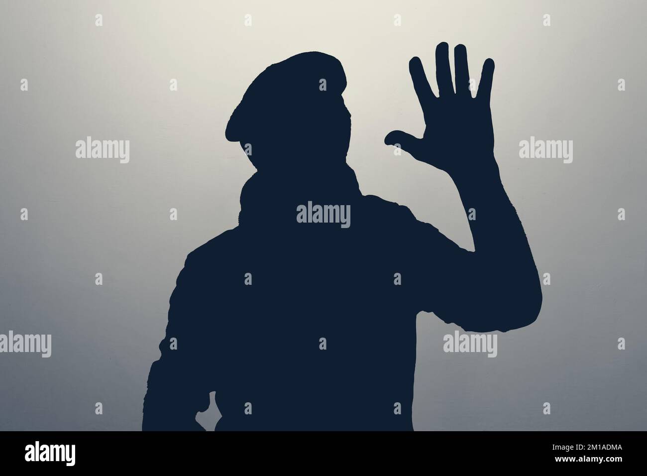 Silhouette of man waving hand in hello gesture. Anonym club concept ...