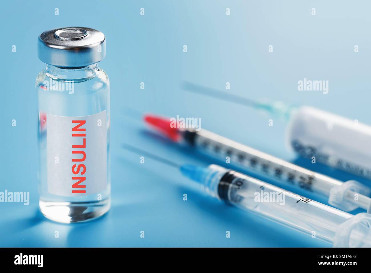Ampoule bottle with insulin, needles and syringes for medical ...