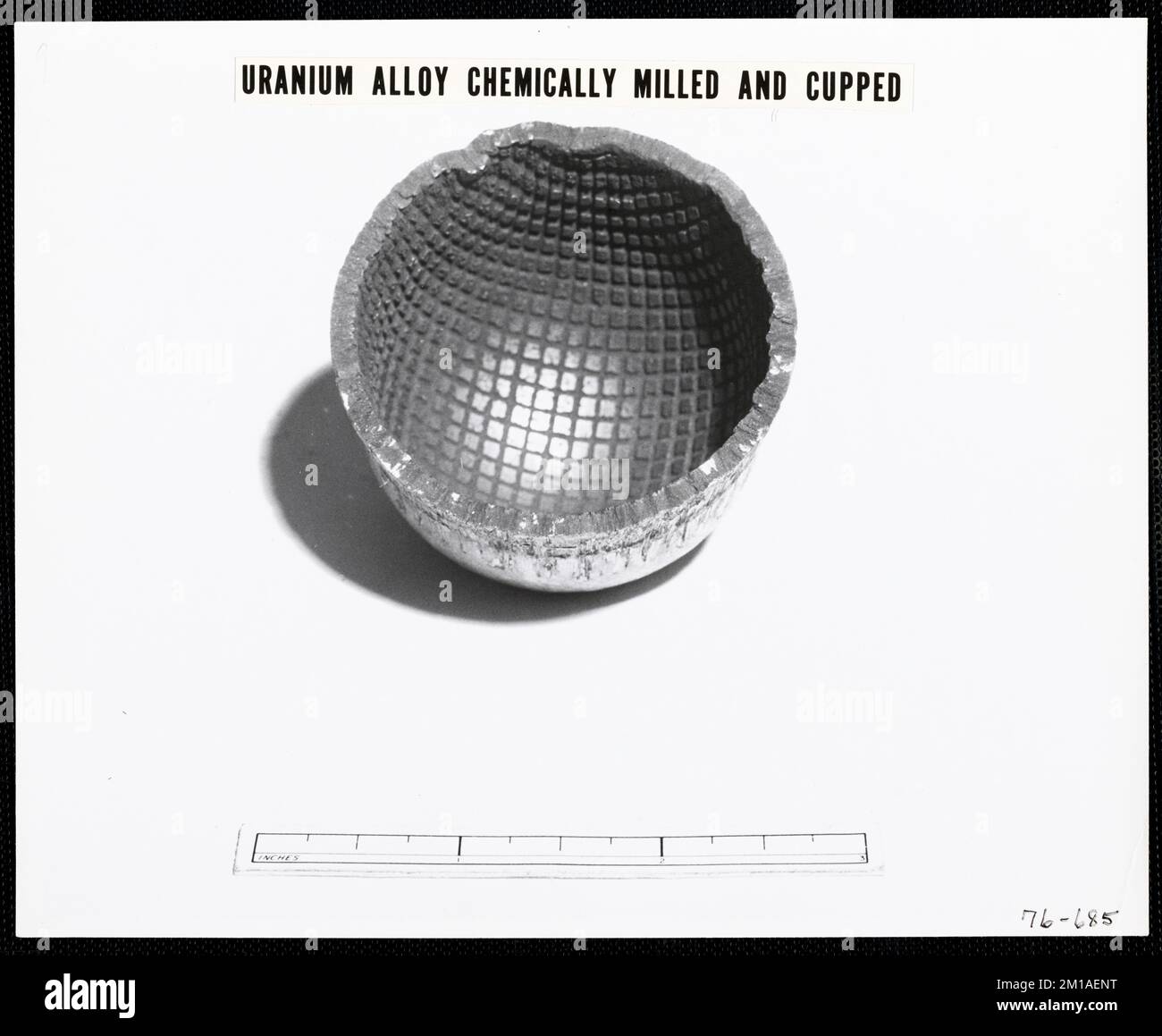 Uranium alloy chemically milled and cupped , Ordnance industry ...
