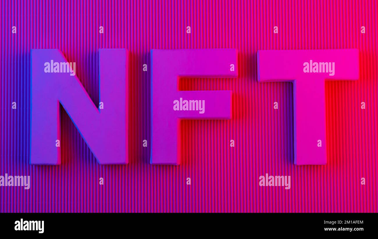 NFT non-fungible token on a neon pink-purple background. Crypto art ...