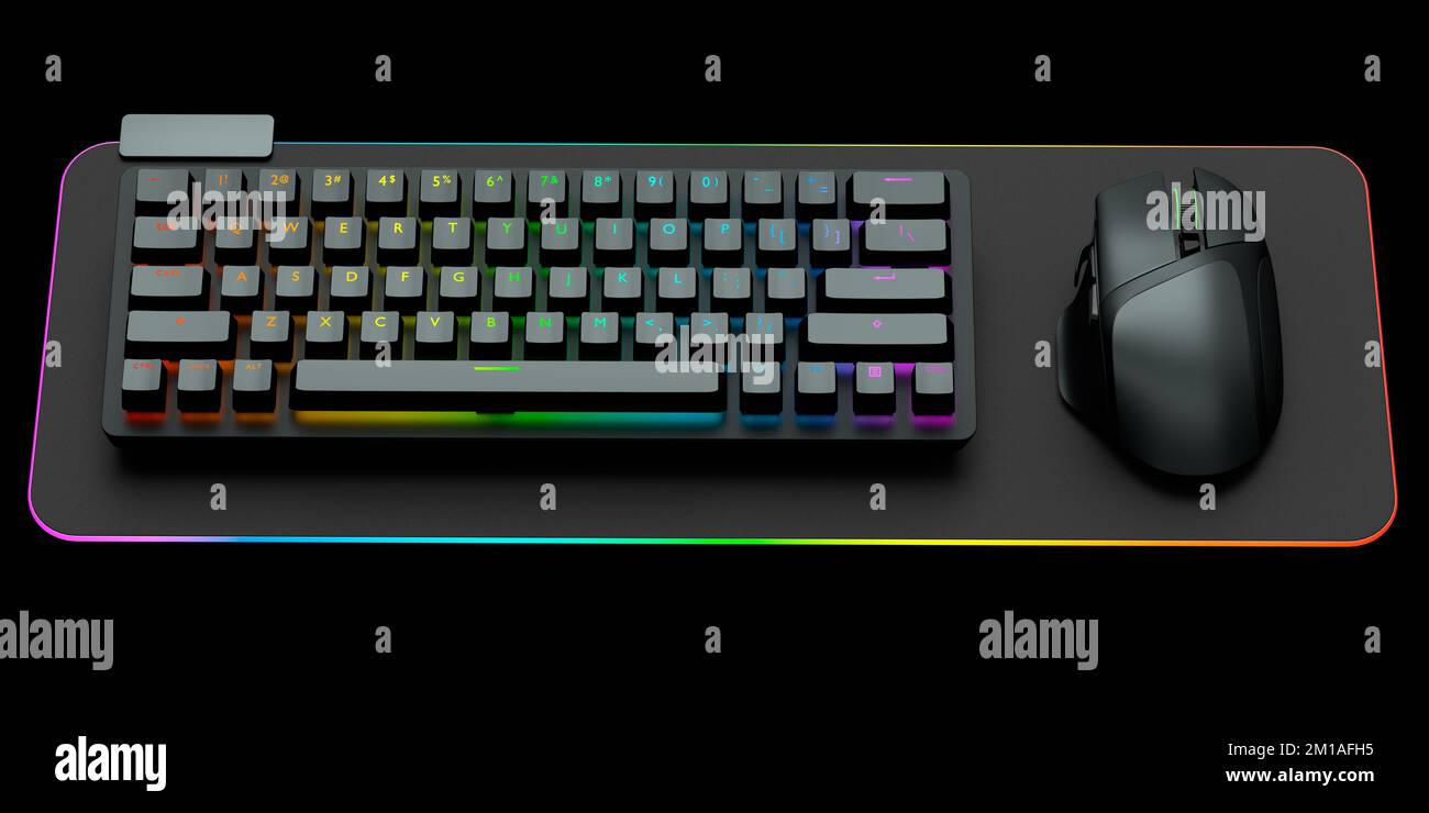 Computer keyboard and mouse on professional pad isolated on black ...