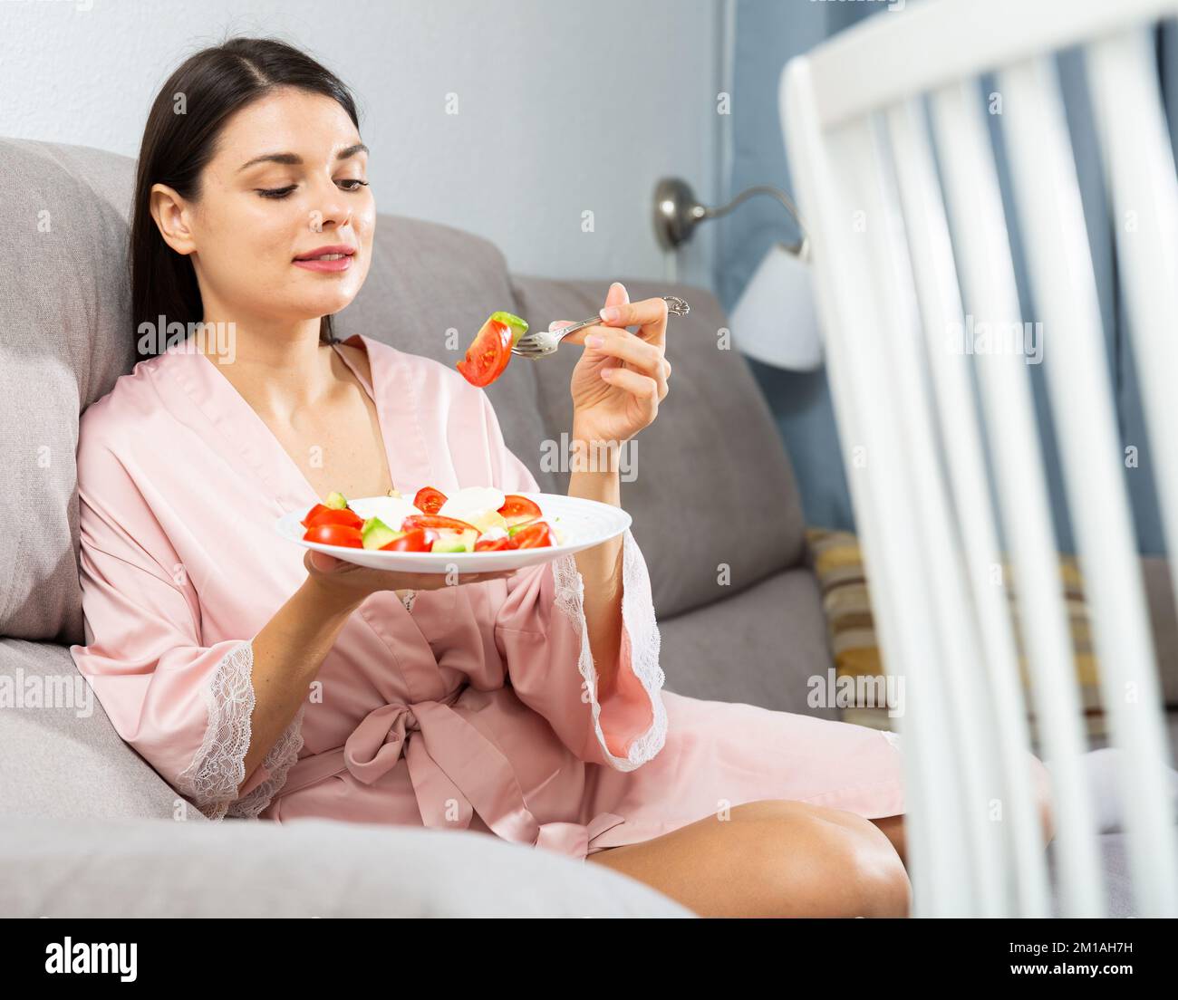 Young healthy woman eating mozzarella hi-res stock photography and ...