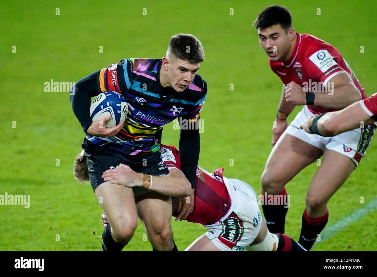 Ospreys’ Joe Hawkins is tackled by Leicester Tigers’ Charlie Atkinson ...