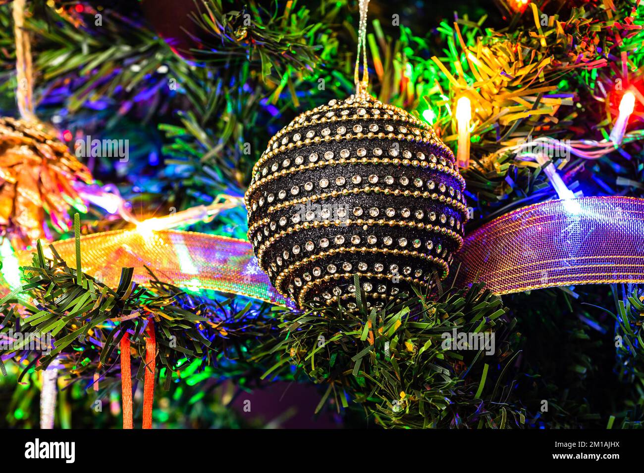 Christmas tree decorations with Christmas lights Stock Photo - Alamy
