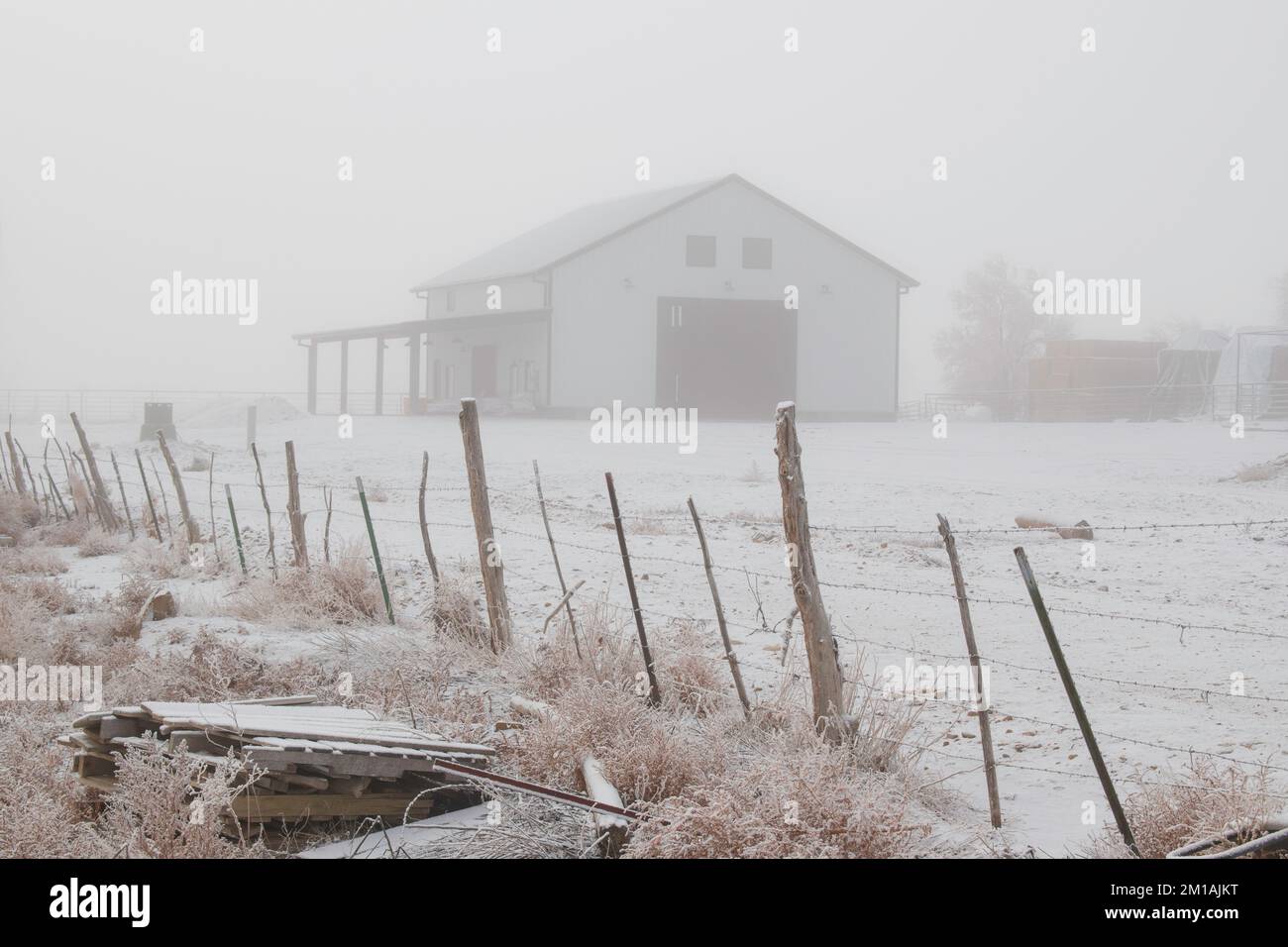 Big White Farm Barn in the Distance on a Cold Foggy Winter Morning ...