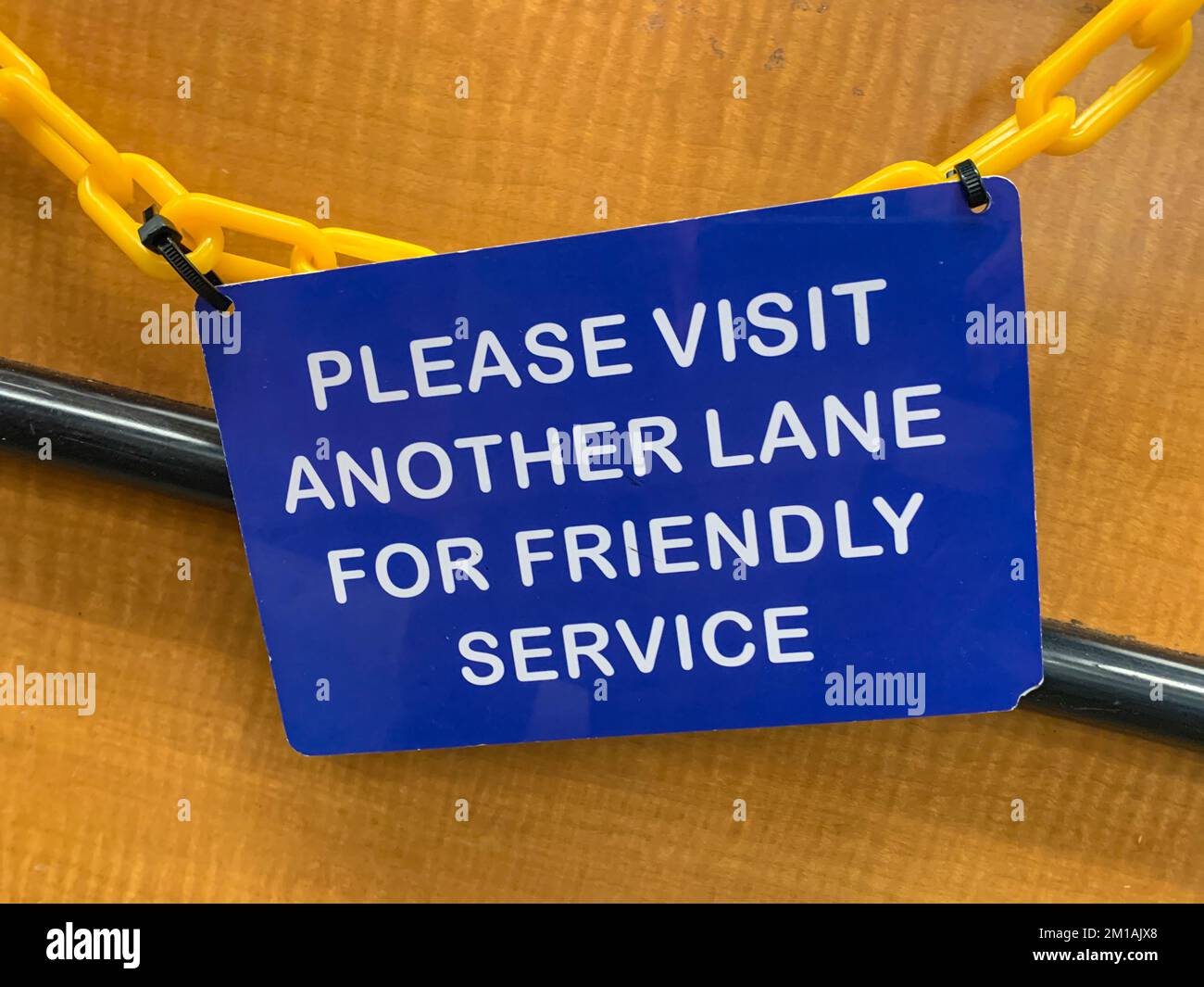 Please Visit Another Lane For Friendly Service Sign at Local Grocery ...
