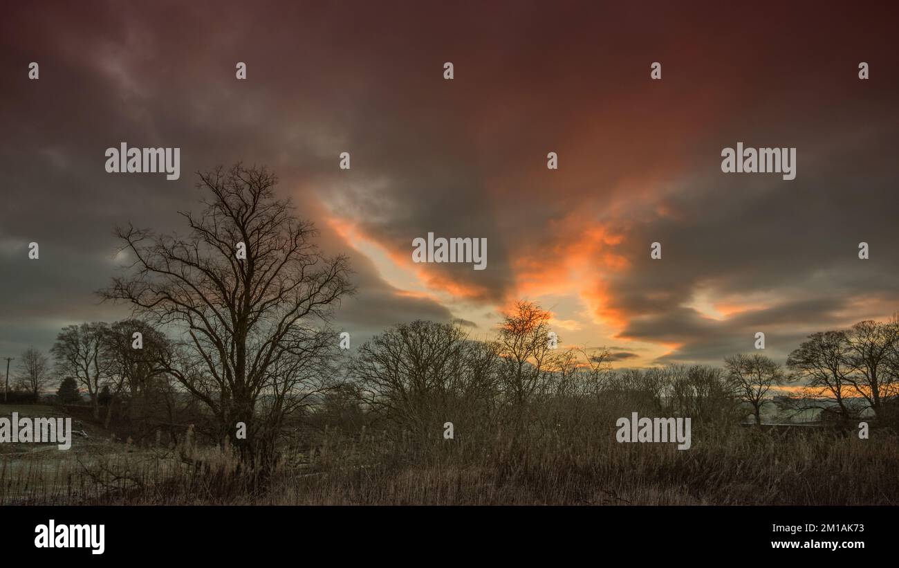 Setting sun as seen from Platform 1 at Long Preston railway station ...