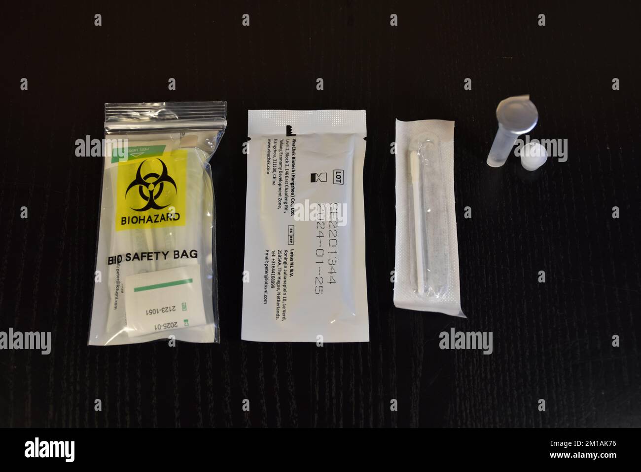 Coronavirus self-testing kit on a black background Stock Photo - Alamy