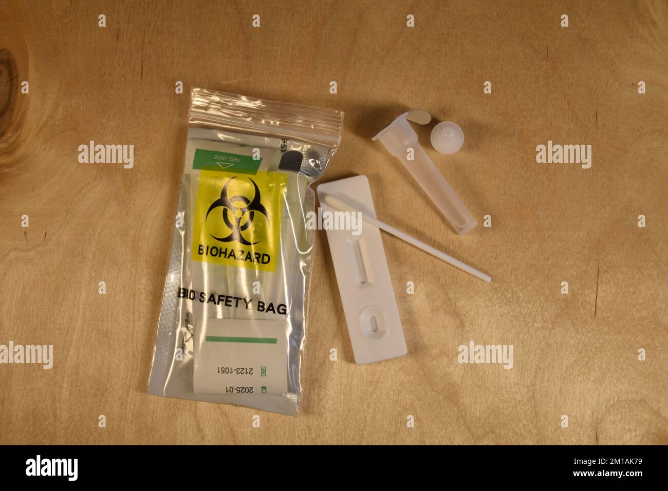 Coronavirus rapid self-testing kit in a wooden background Stock Photo ...