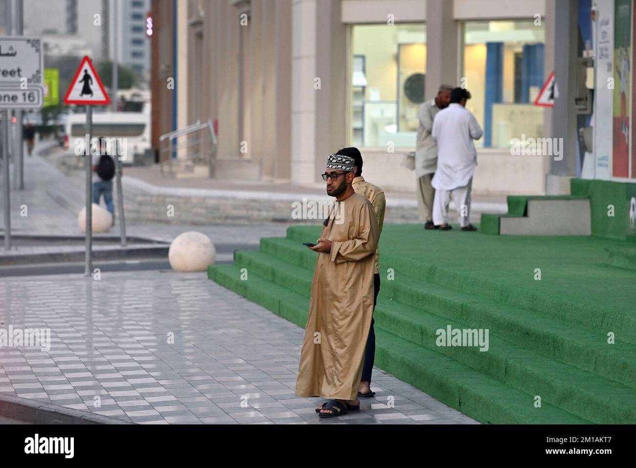 Impressions from Doha/Qatar. Street scene: man, male person of Arabic ...