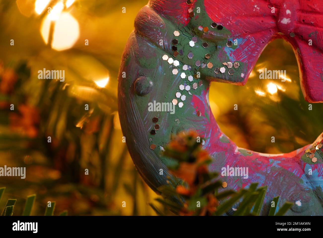 Christmas tree decorations and ornaments close up in macro showing the ...