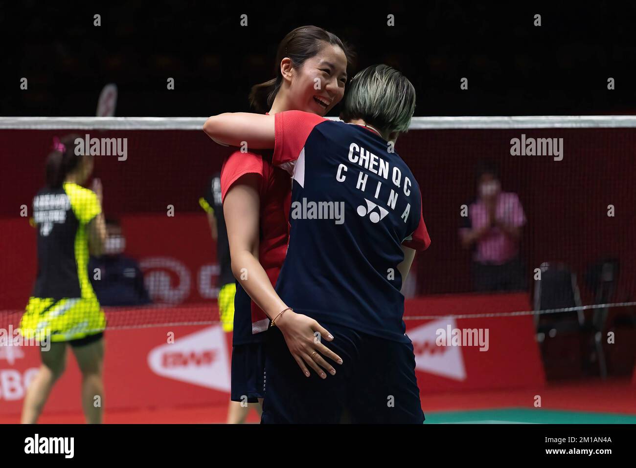 Chen Qing Chen (R) and Jia Yi Fan (L) of China celebrate after a win over Benyapa Aimsaard and ...