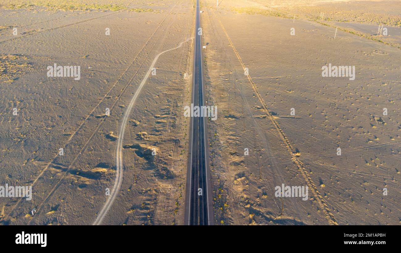 An aerial view of a highway covered with sand Stock Photo - Alamy