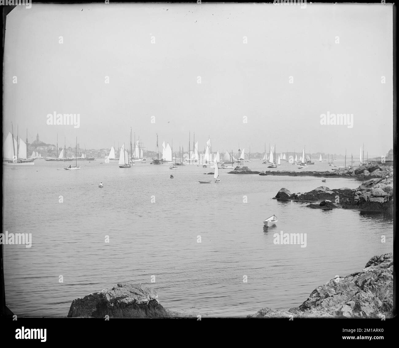 View across Marblehead Harbor toward Abbot Hall with many schooners and ...