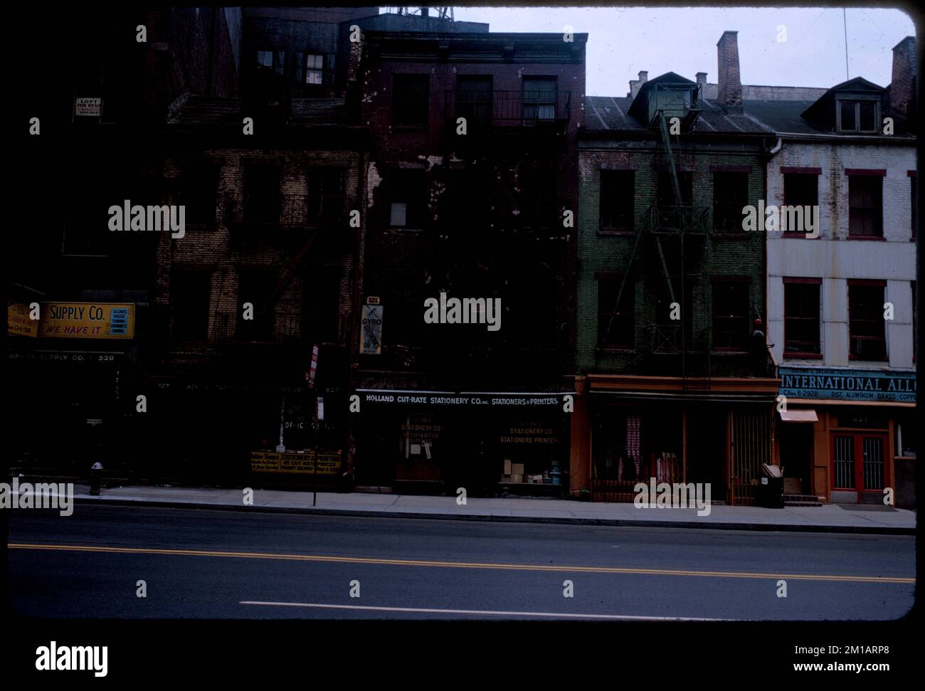 View across street of row of city buildings, likely Manhattan, New York ...