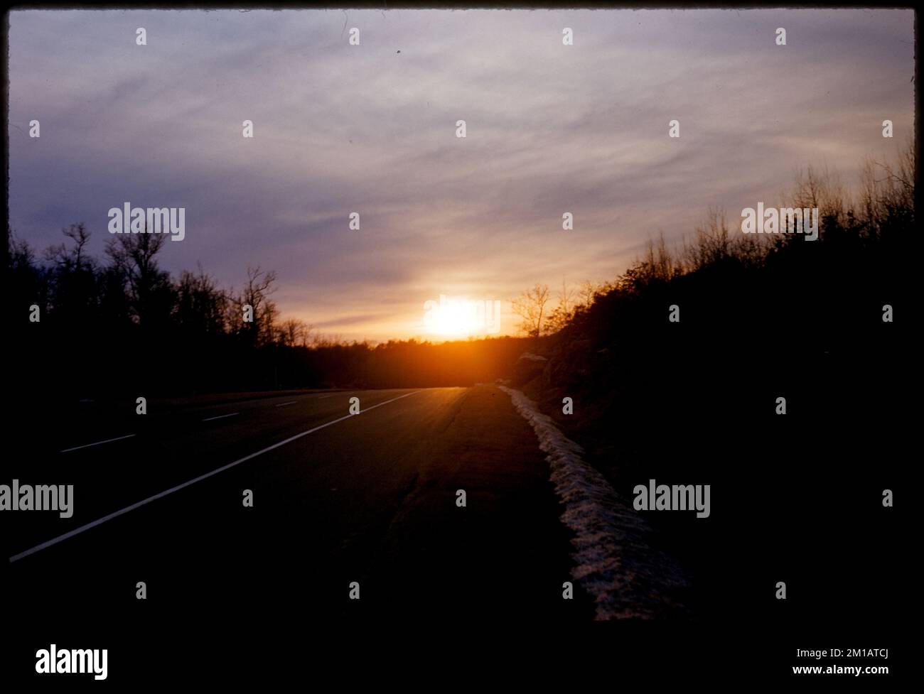 View down street of sunset , Sunrises & sunsets. Edmund L. Mitchell ...