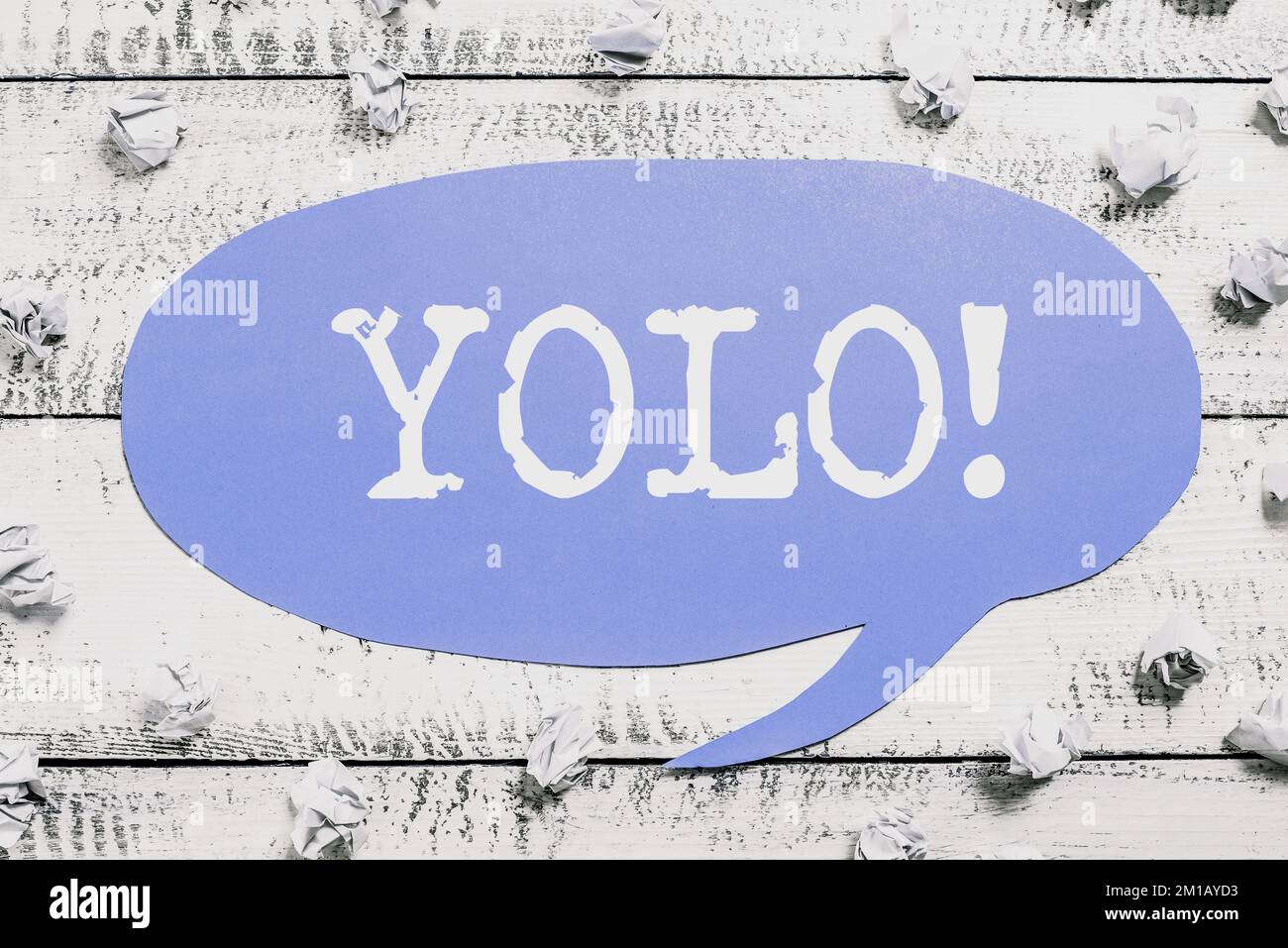 Hand writing sign Yolo. Word for stand for You only live once popular ...