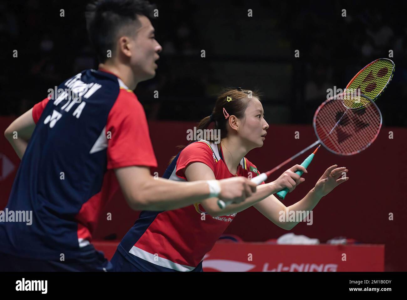 Zheng Si Wei (L) and Huang Ya Qiong (R) of China play against Dechapol ...