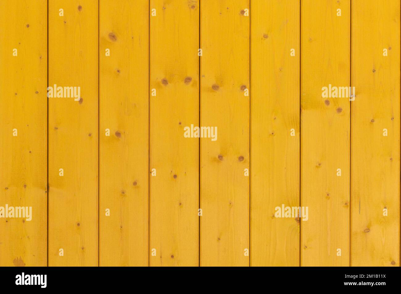 A rustic wooden background in yellow color with copy space Stock Photo ...