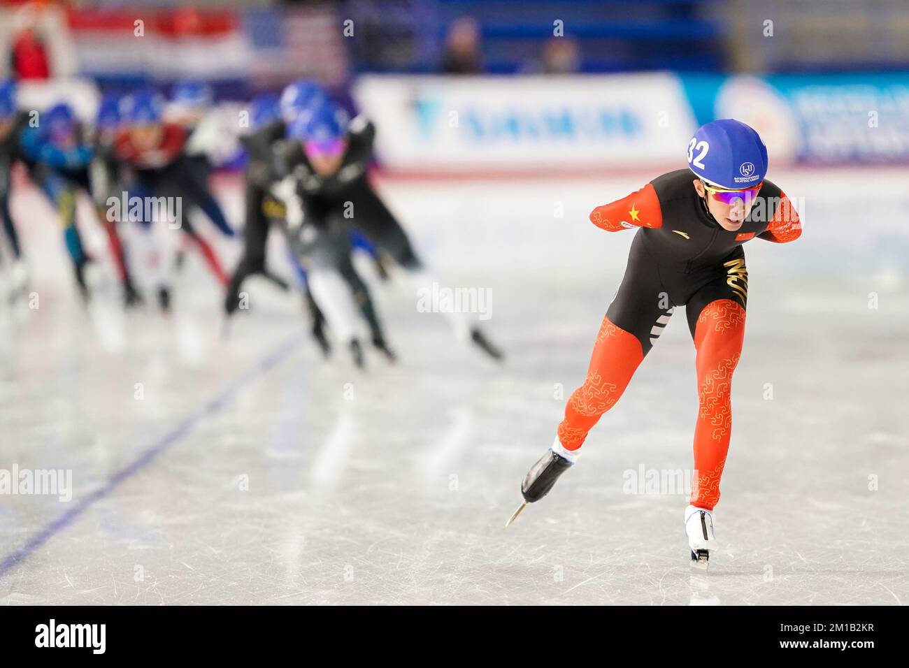 CALGARY, CANADA - DECEMBER 11: Hongli Wang of China competing on the ...