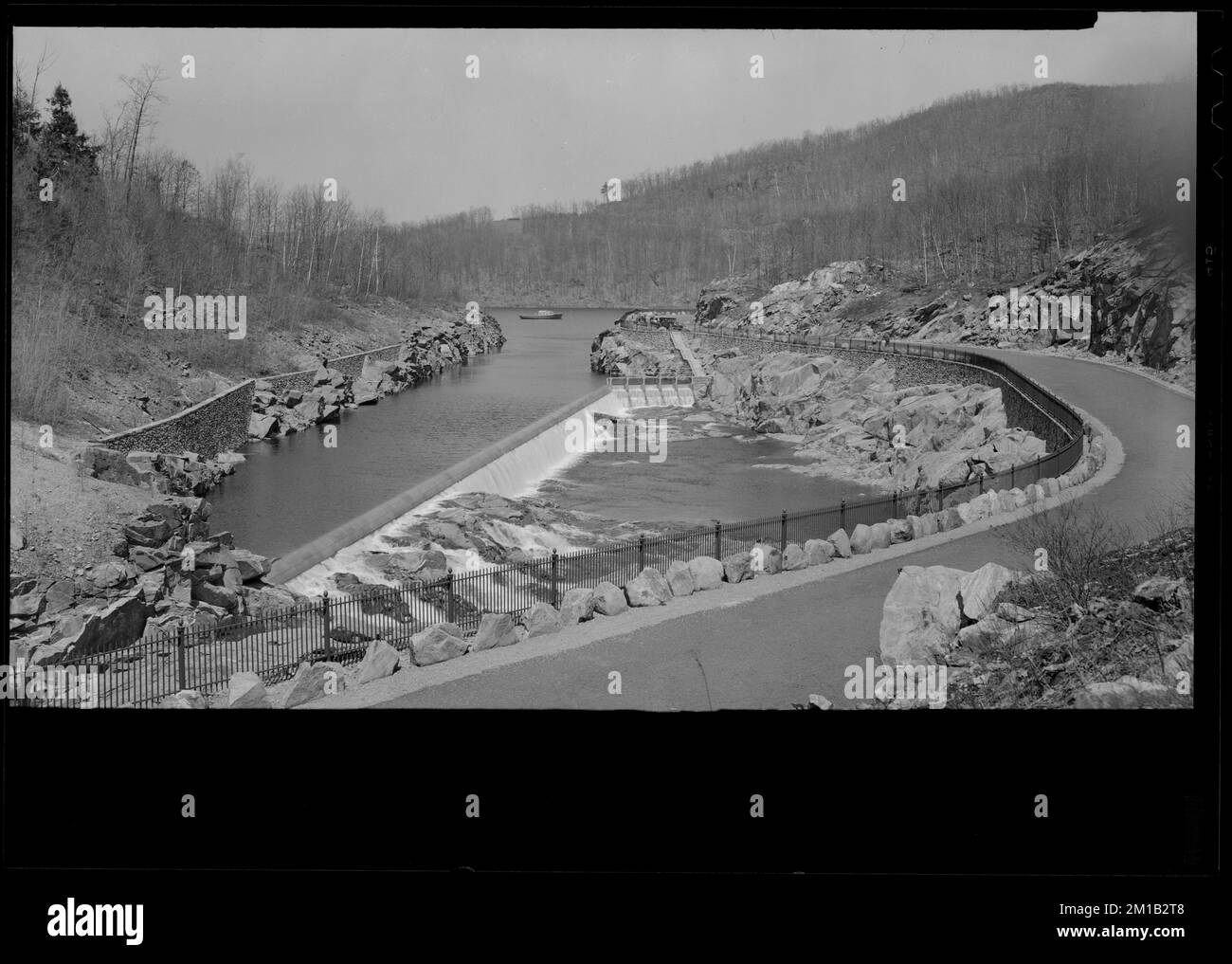 View of Winsor Dam Spillway, showing water flowing over crest, Quabbin ...