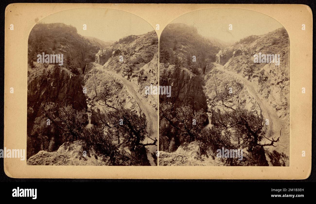 View up mountain road, with stream rushing alongside , Mountains ...