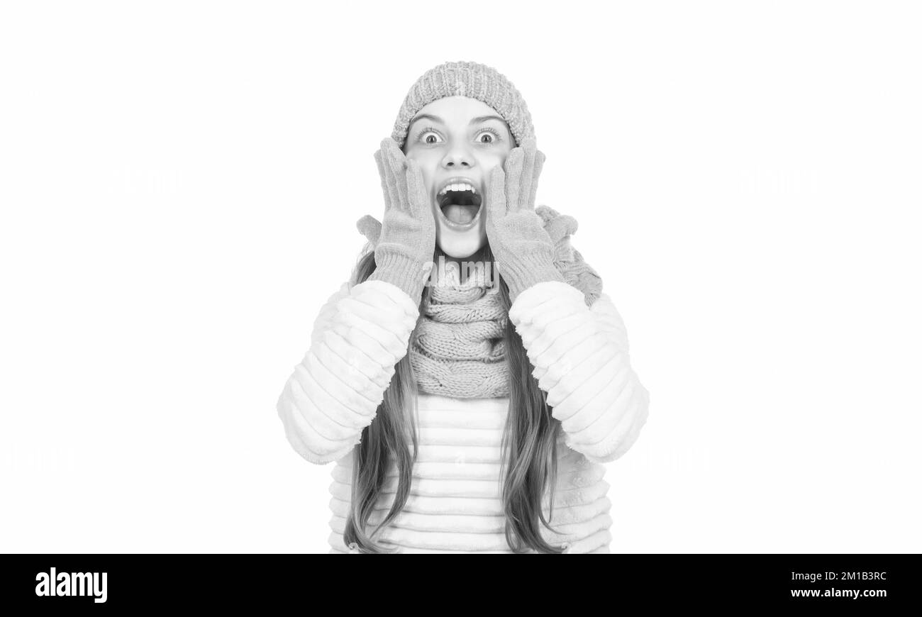 surprised teen girl in knitted hat scarf and gloves warm clothes ...