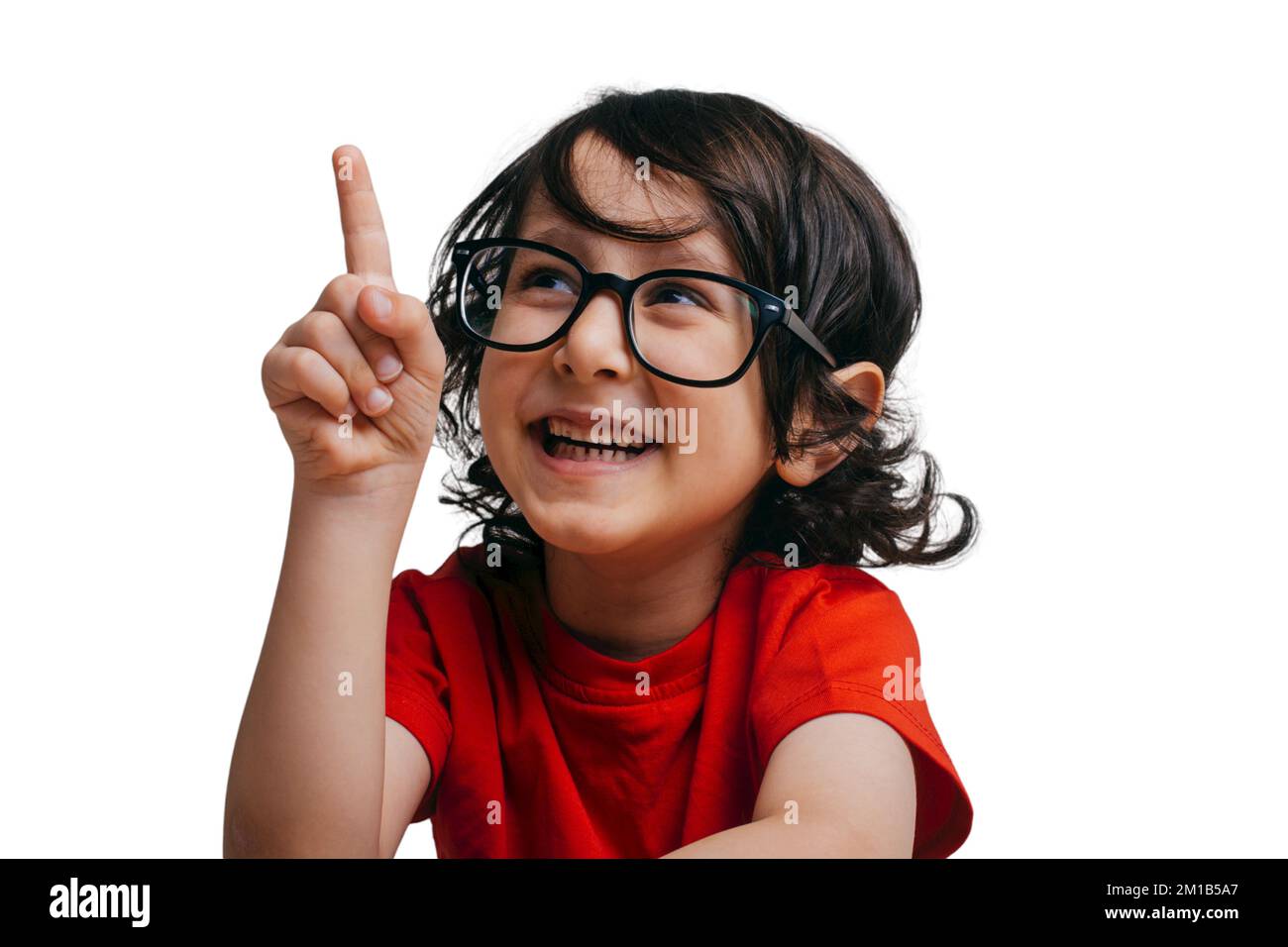 boy holding a hand up isolated on a white background. Cute happy child ...