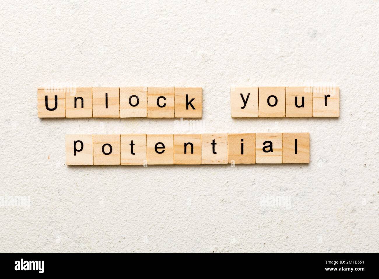 unlock your potential word written on wood block. unlock your potential ...