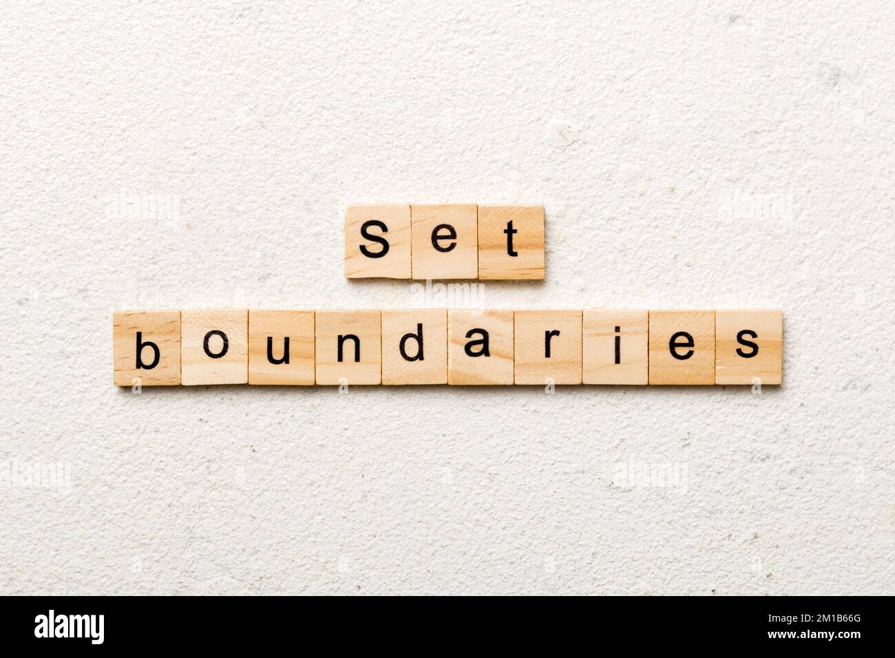 set boundaries word written on wood block. set boundaries text on table ...