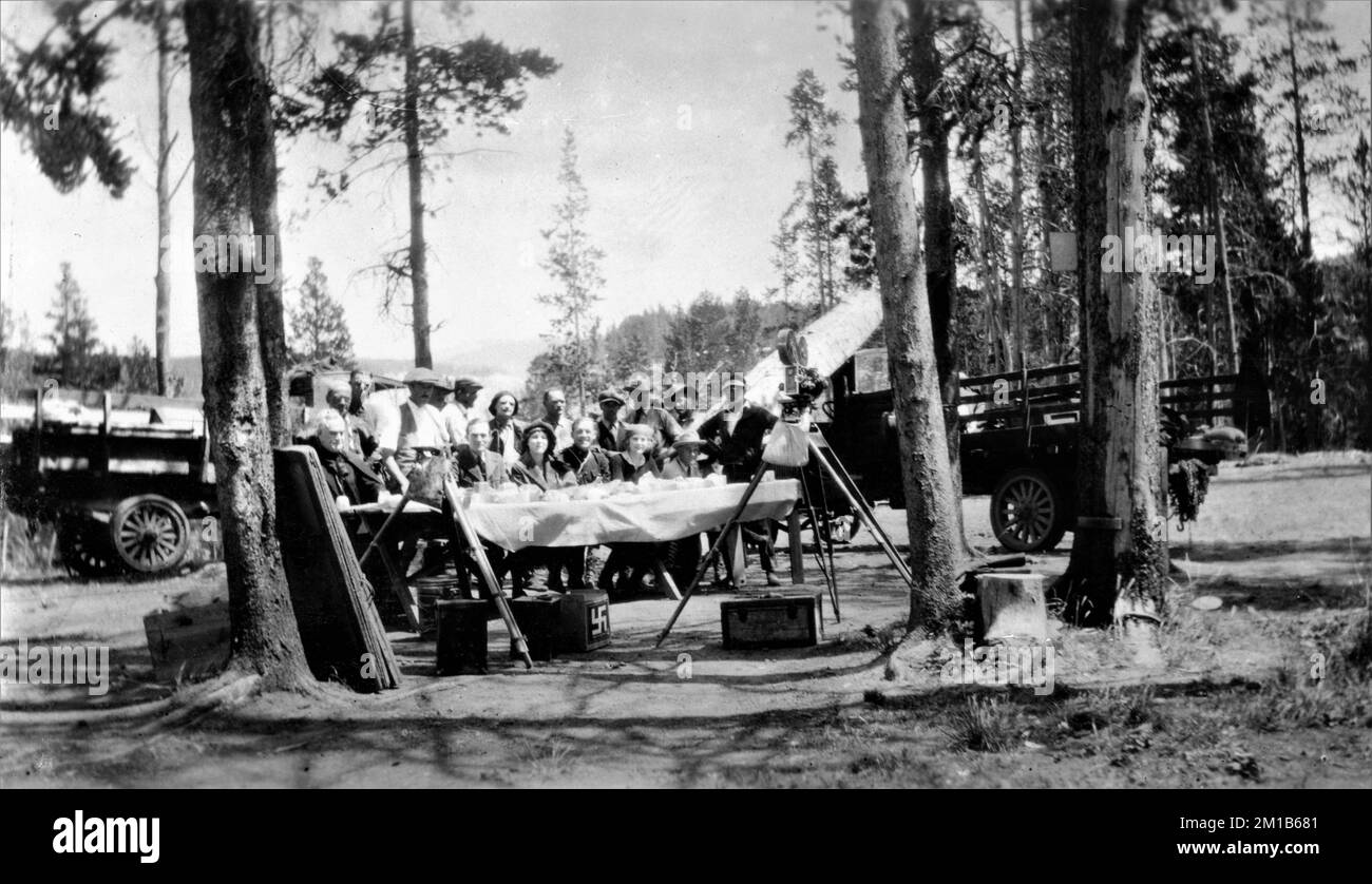 ANN LITTLE LEONARD CLAPHAM (later TOM LONDON) and EDITH STAYART on set location candid having ...