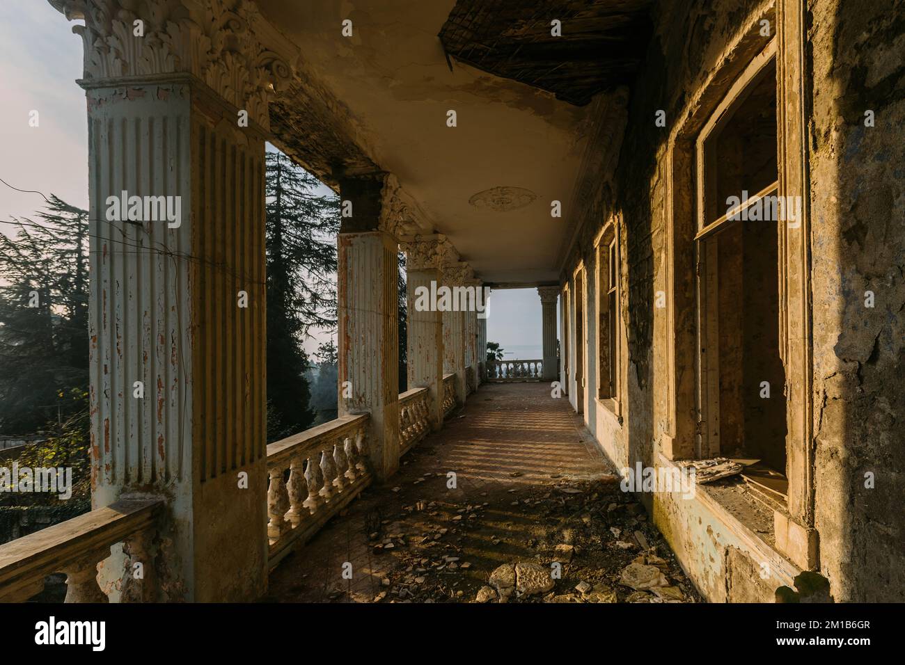 Old colonnade in an abandoned mansion Stock Photo - Alamy