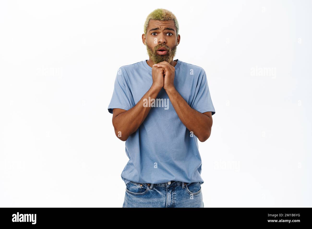 Man looks concerned, express compassion and worry, staring touched at ...