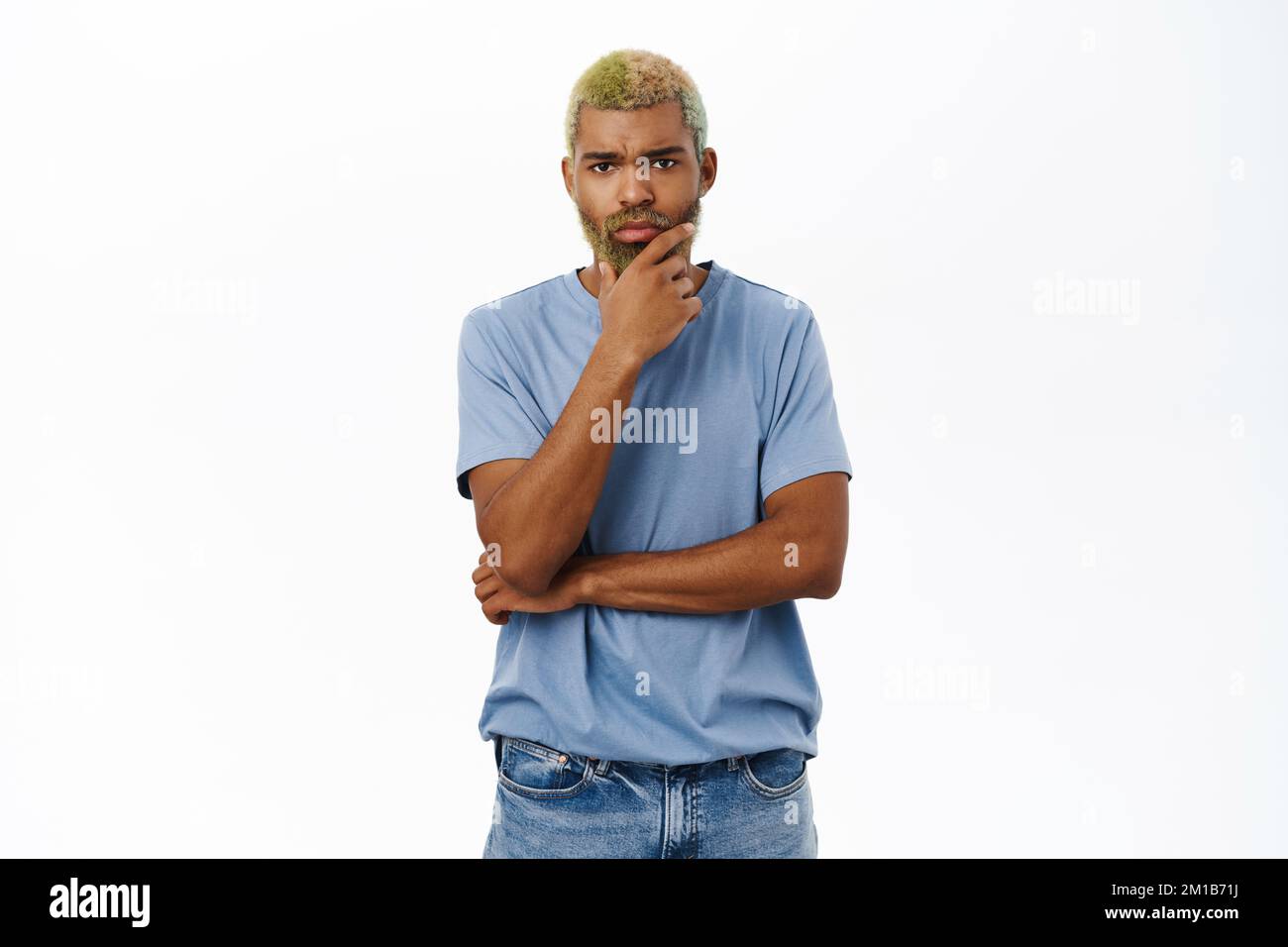 Portrait of serious man thinking, making decision, standing thoughtful ...