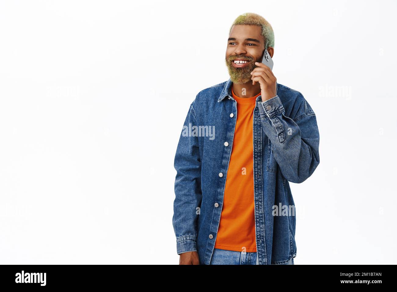 Stylish african american man talks on mobile phone. Young guy on a call ...