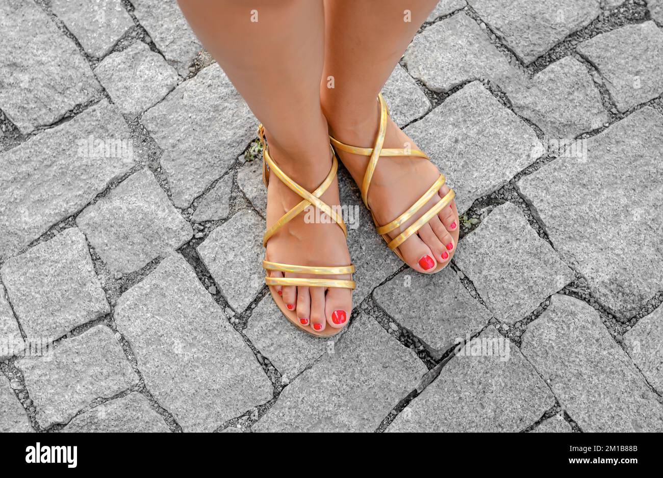 Girl wearing sandals hi-res stock photography and images - Alamy