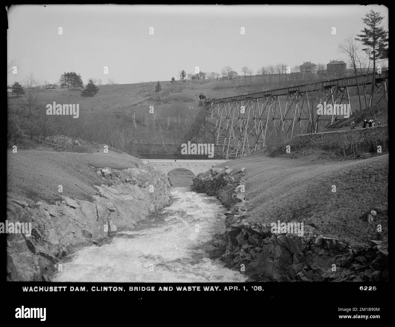 Wachusett Dam, bridge and wasteway, water running down waste channel ...