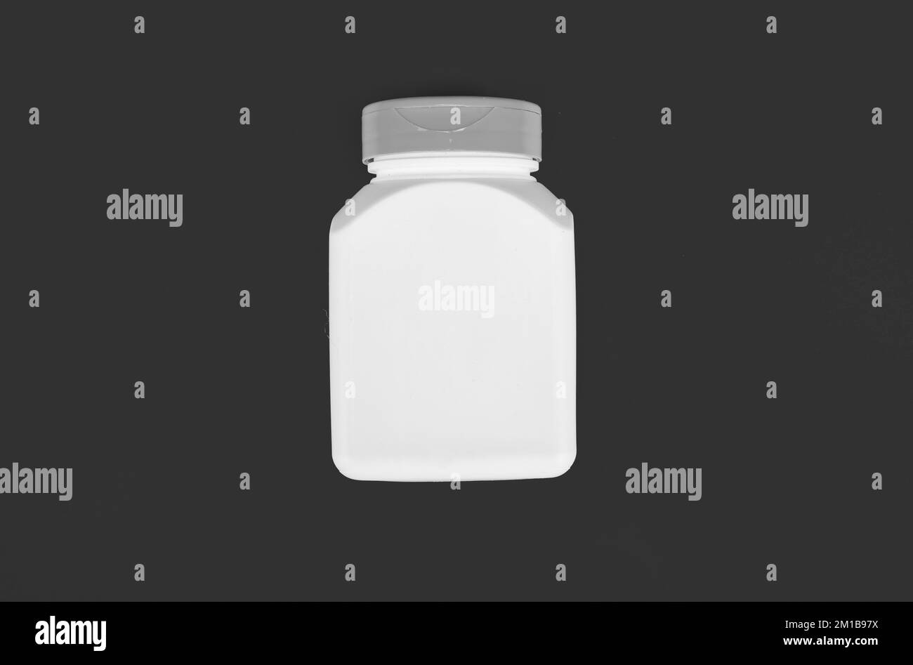 multivitamin jar white color on pink background, vitamin Stock Photo ...