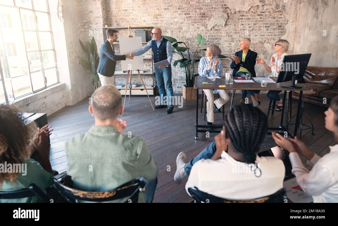 Meeting of a marketing team that has to planning and developing new ...