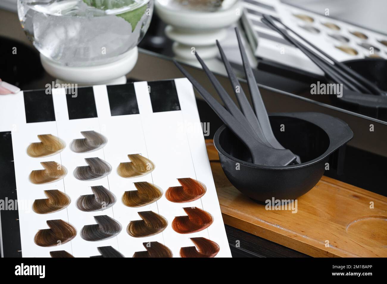 Hair color samples, hair palette and working tools in hairdressing ...