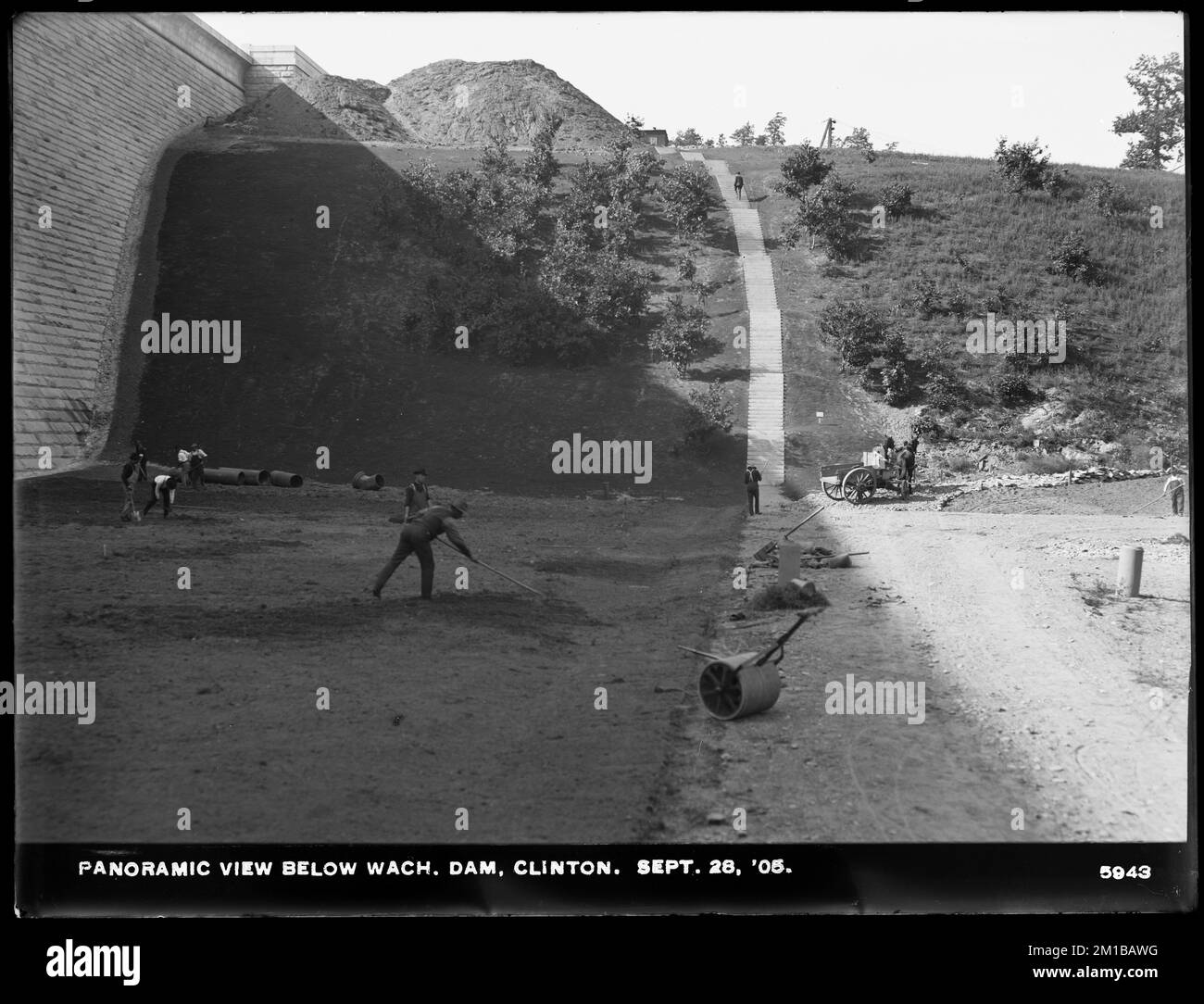 Wachusett Dam, panoramic view below dam, grading and loaming at bottom ...