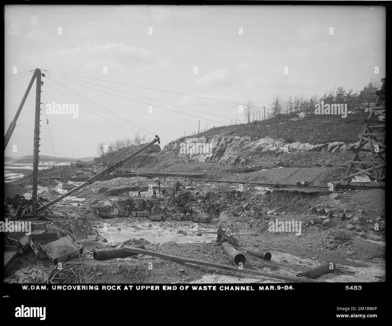 Wachusett Dam, uncovering rock at upper end of waste channel, Clinton ...
