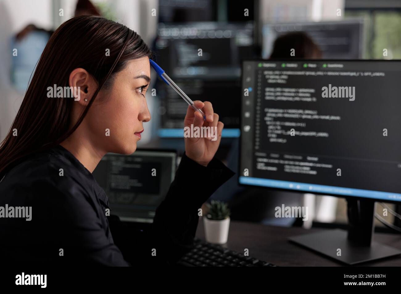 Pensive Asian It Programmer Thinking At Html Script Development Brainstorming Ideas To Create