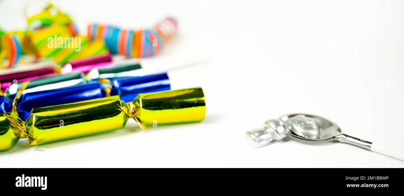 New years scene with paper streamer, pouring lead and telling fortunes ...