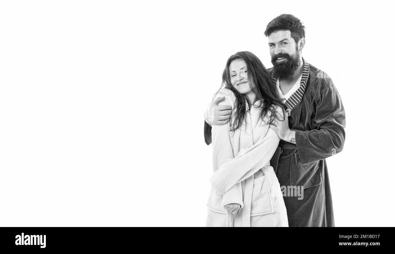Love and be loved. Couple in love. Happy family in robes. Man hug ...