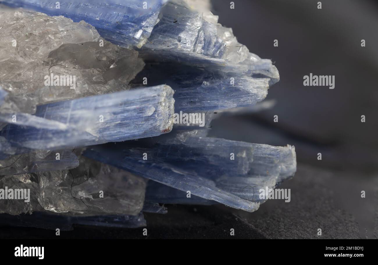 mineral sample of kyanite on a black background Stock Photo - Alamy